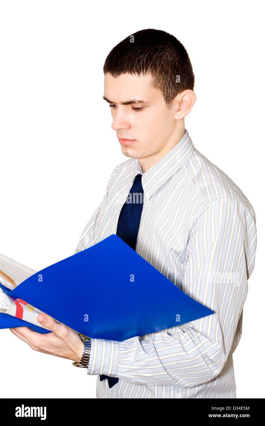 The young man in a striped shirt reads documents in a blue folder Stock ...
