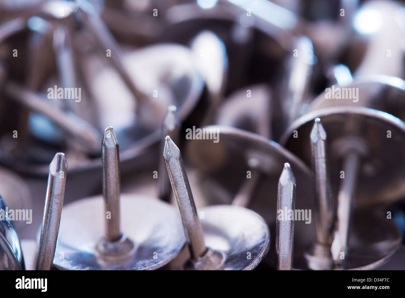 Close up photo of silver push pins Stock Photo - Alamy
