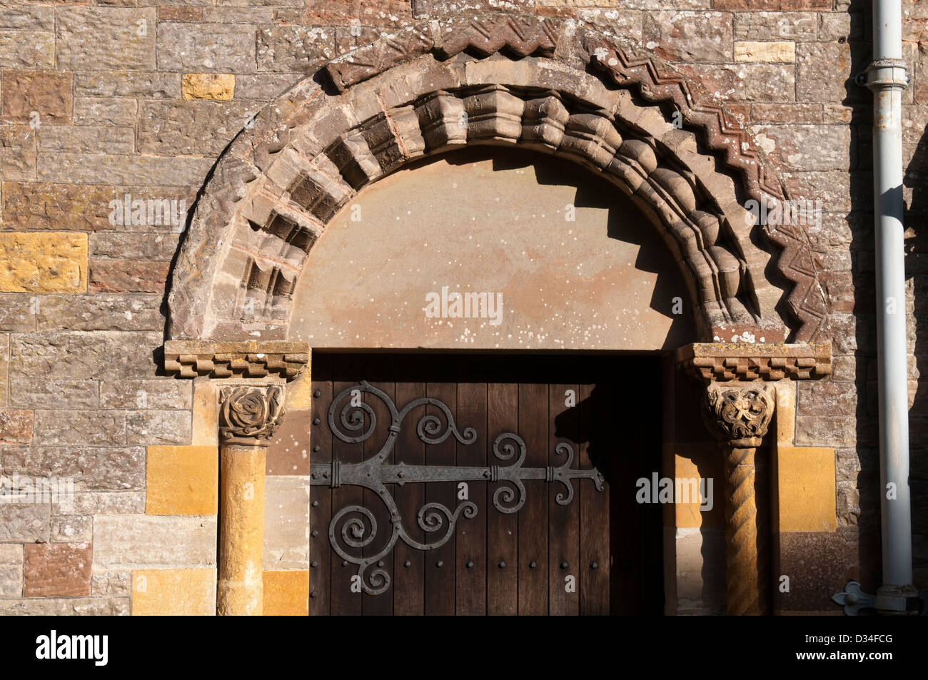 South door, St. Peter`s Church, Rous Lench, Worcestershire, England, UK ...