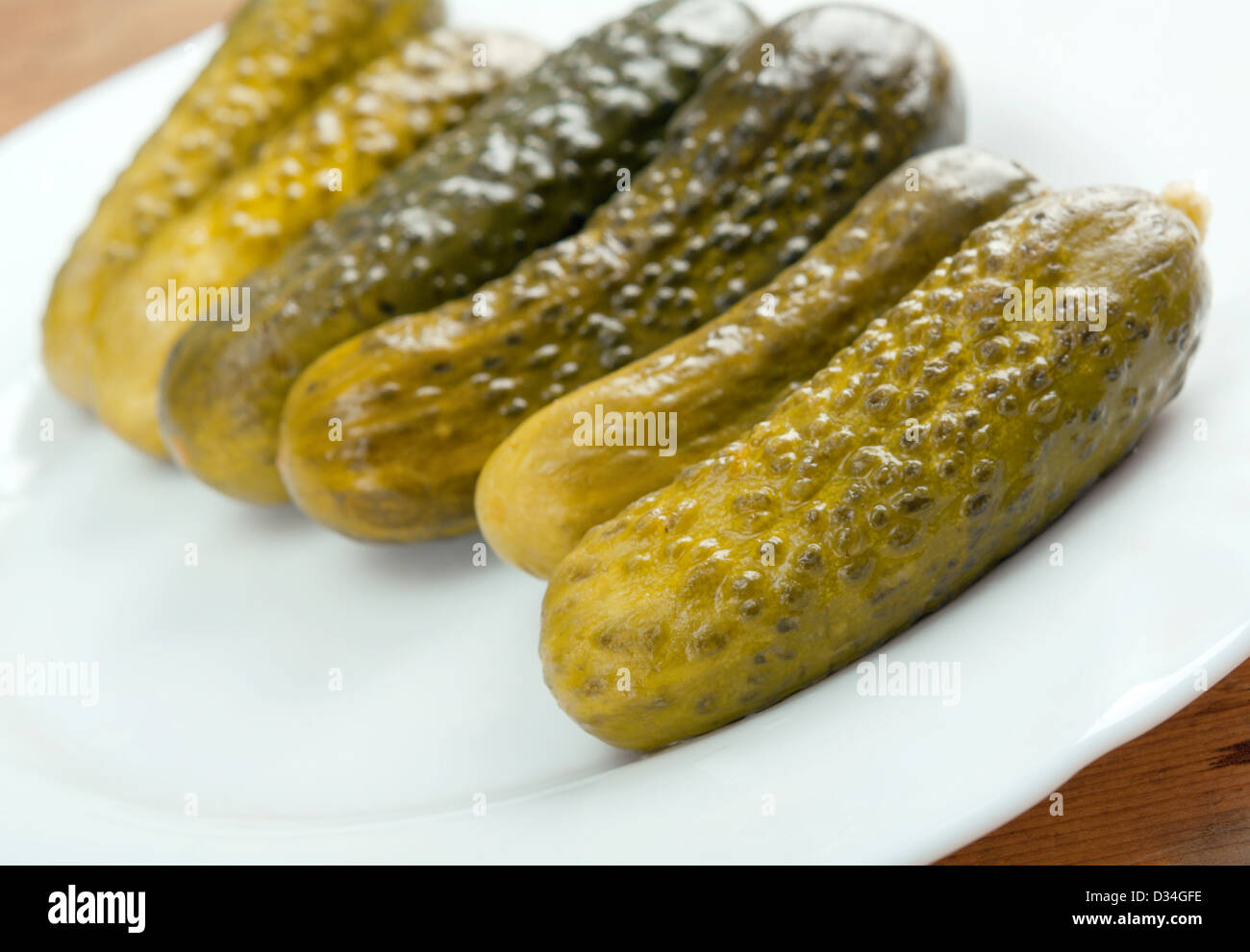 Gherkin pickles close up with washed away by back background Stock ...