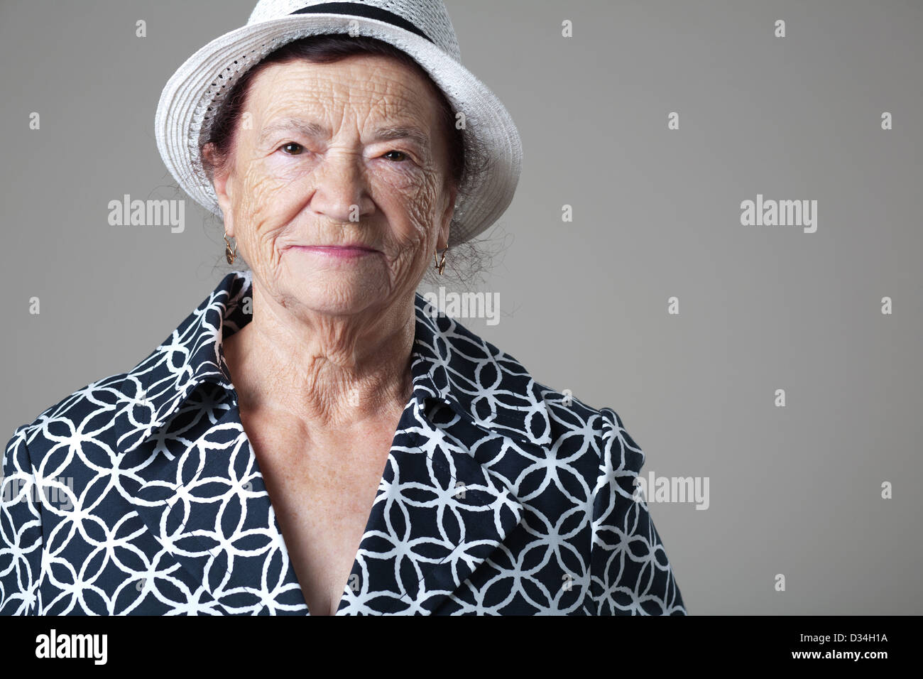 Portrait of a beautiful retired happy senior woman Stock Photo - Alamy