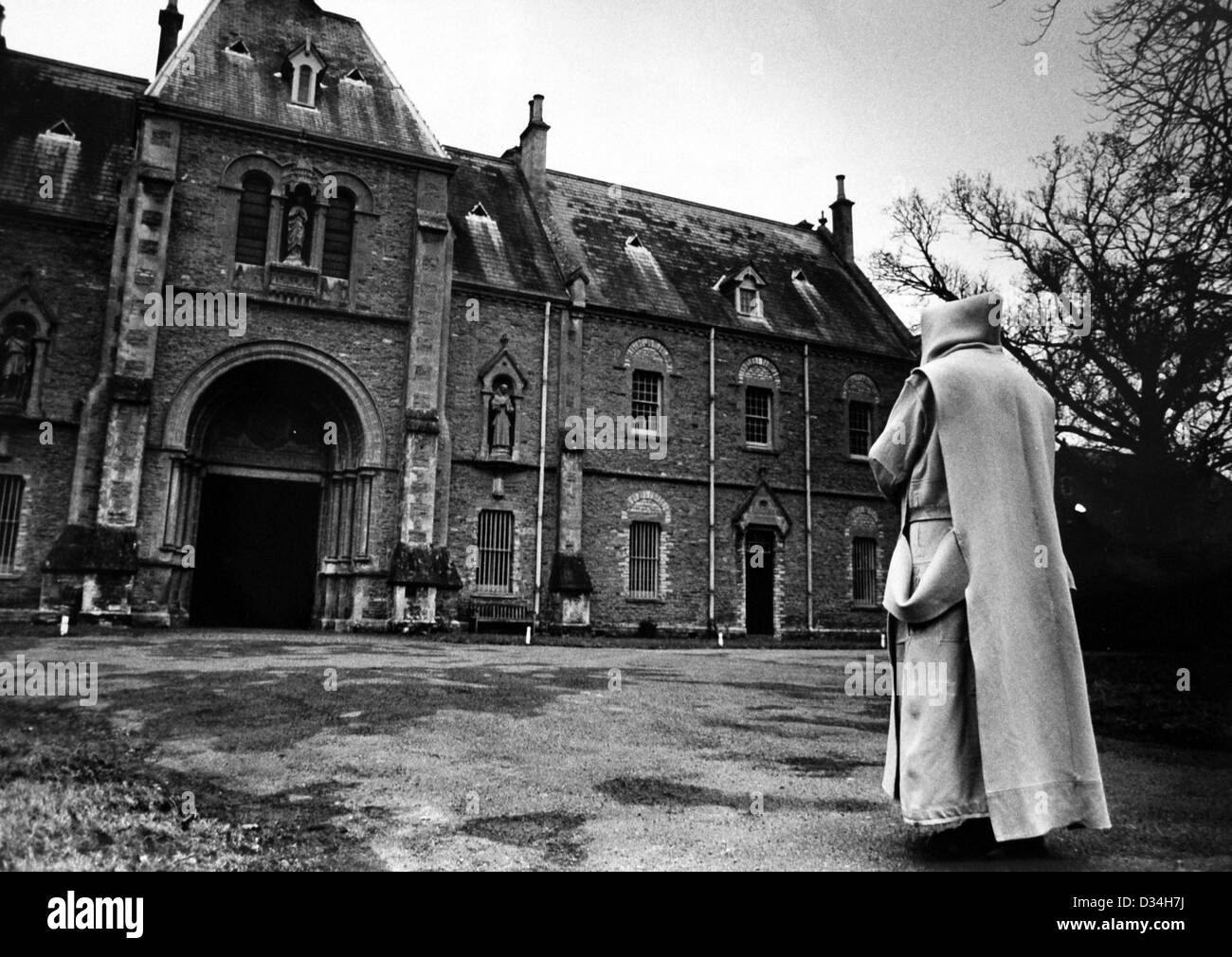 Monk in hood hi-res stock photography and images - Alamy