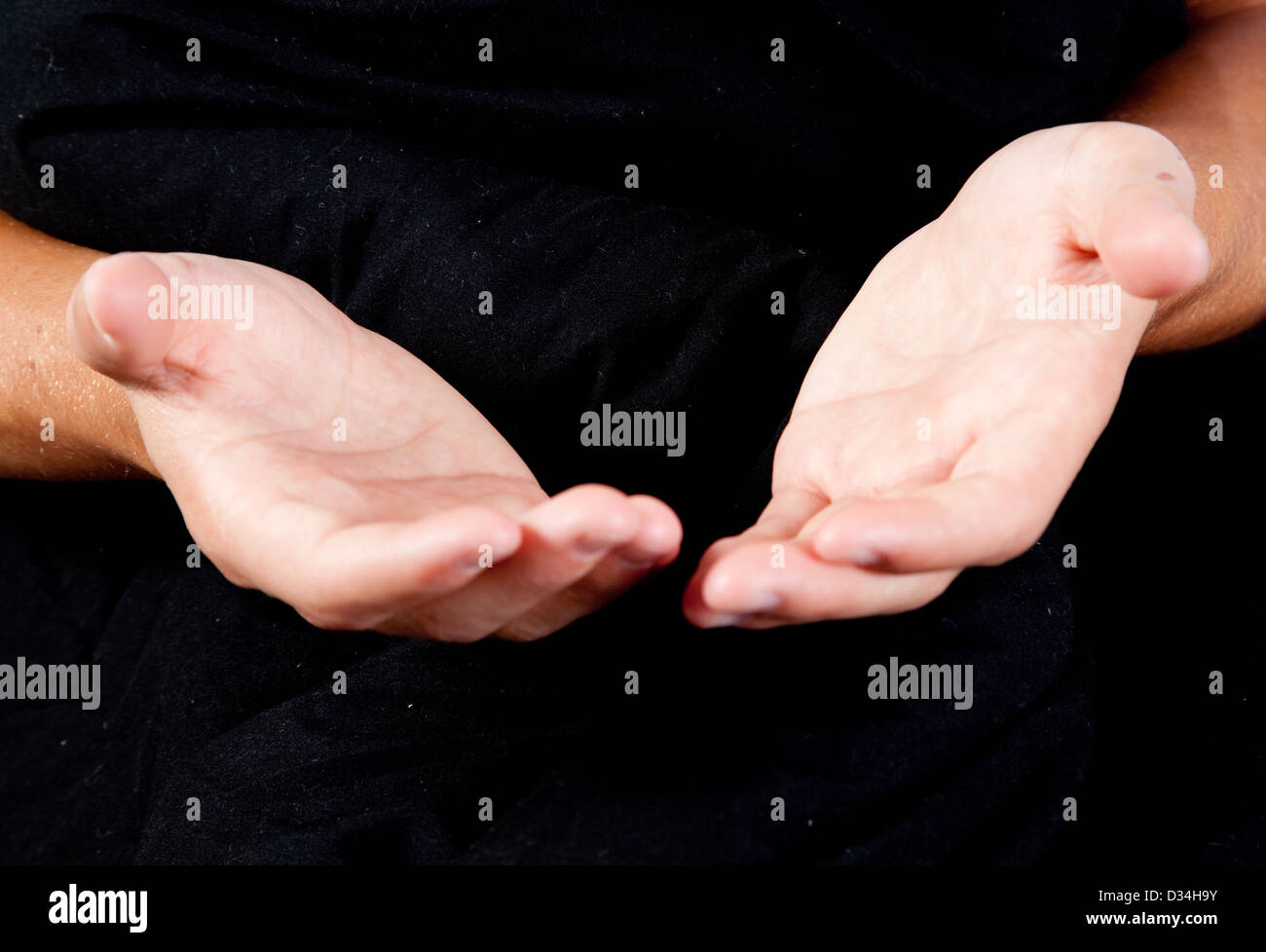 White man's hands open to receive double hand-fulls Stock Photo - Alamy