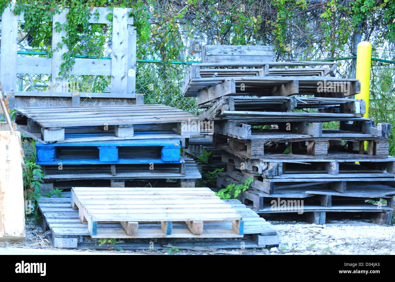 stacked shipping pallets for distribution Stock Photo - Alamy