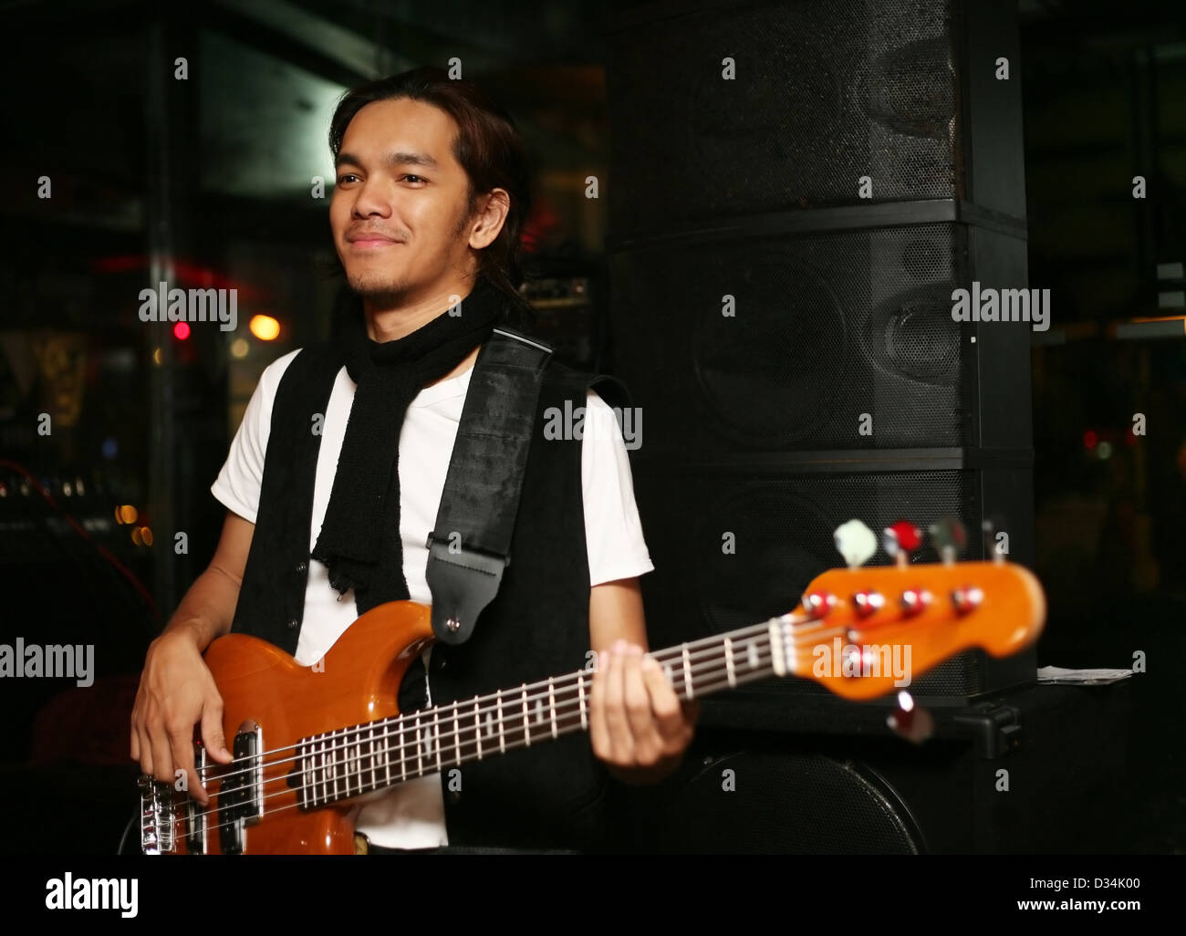 Young musician at an alive concert in a night club "La vida loka". Bali ...