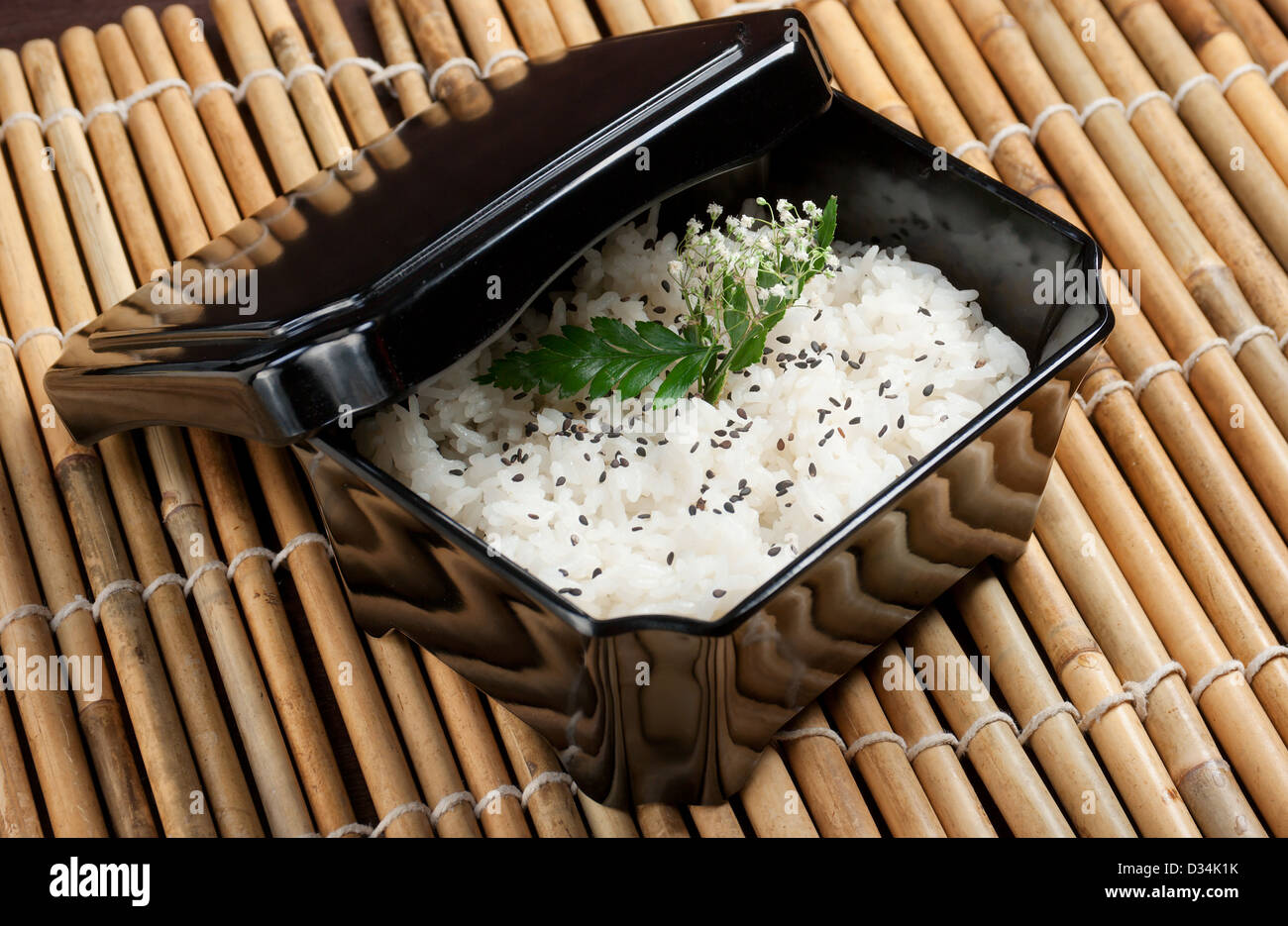 Bowl of cooked rice closeup Stock Photo - Alamy