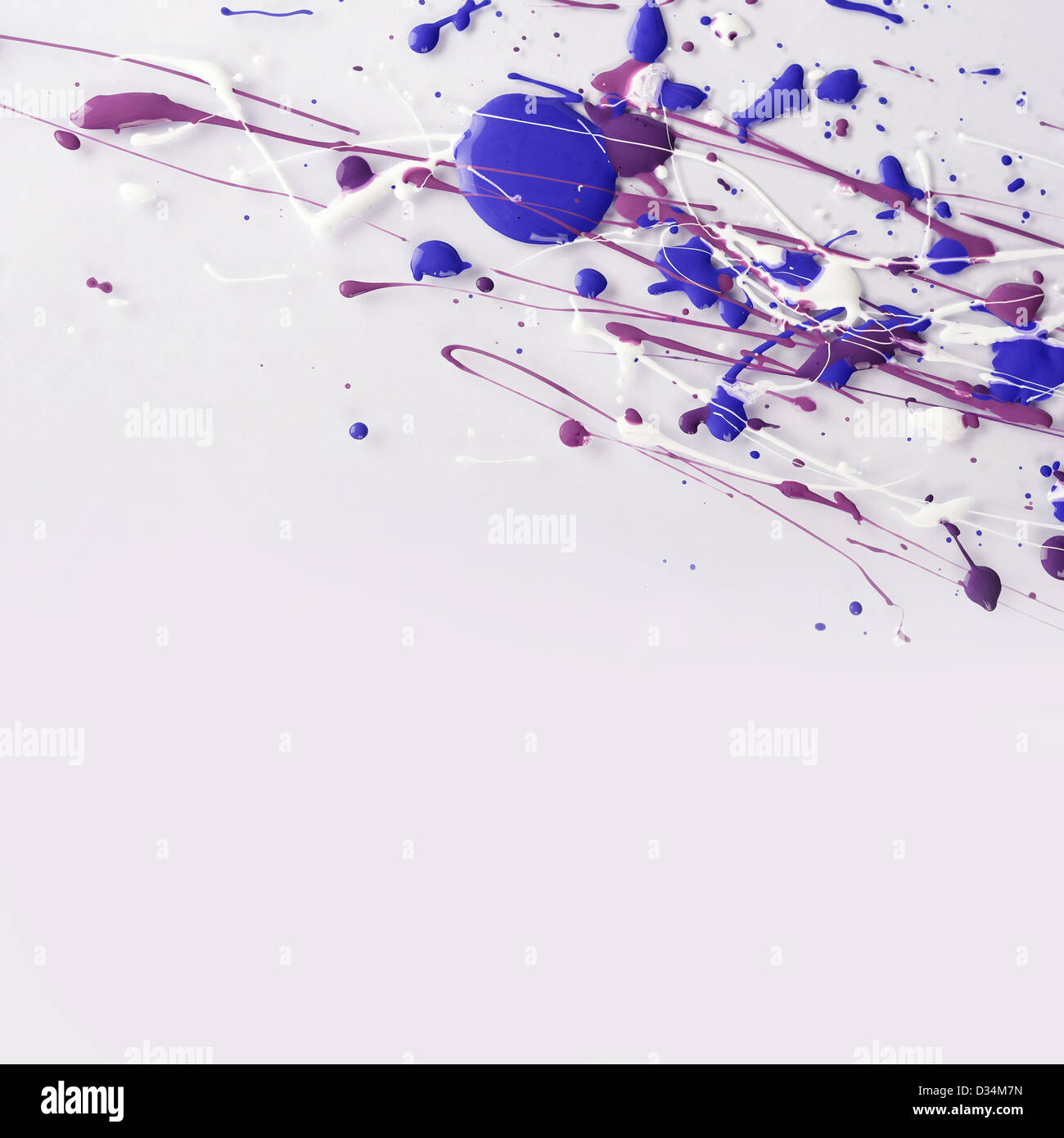Multi color paint drops on light background closeup Stock Photo - Alamy