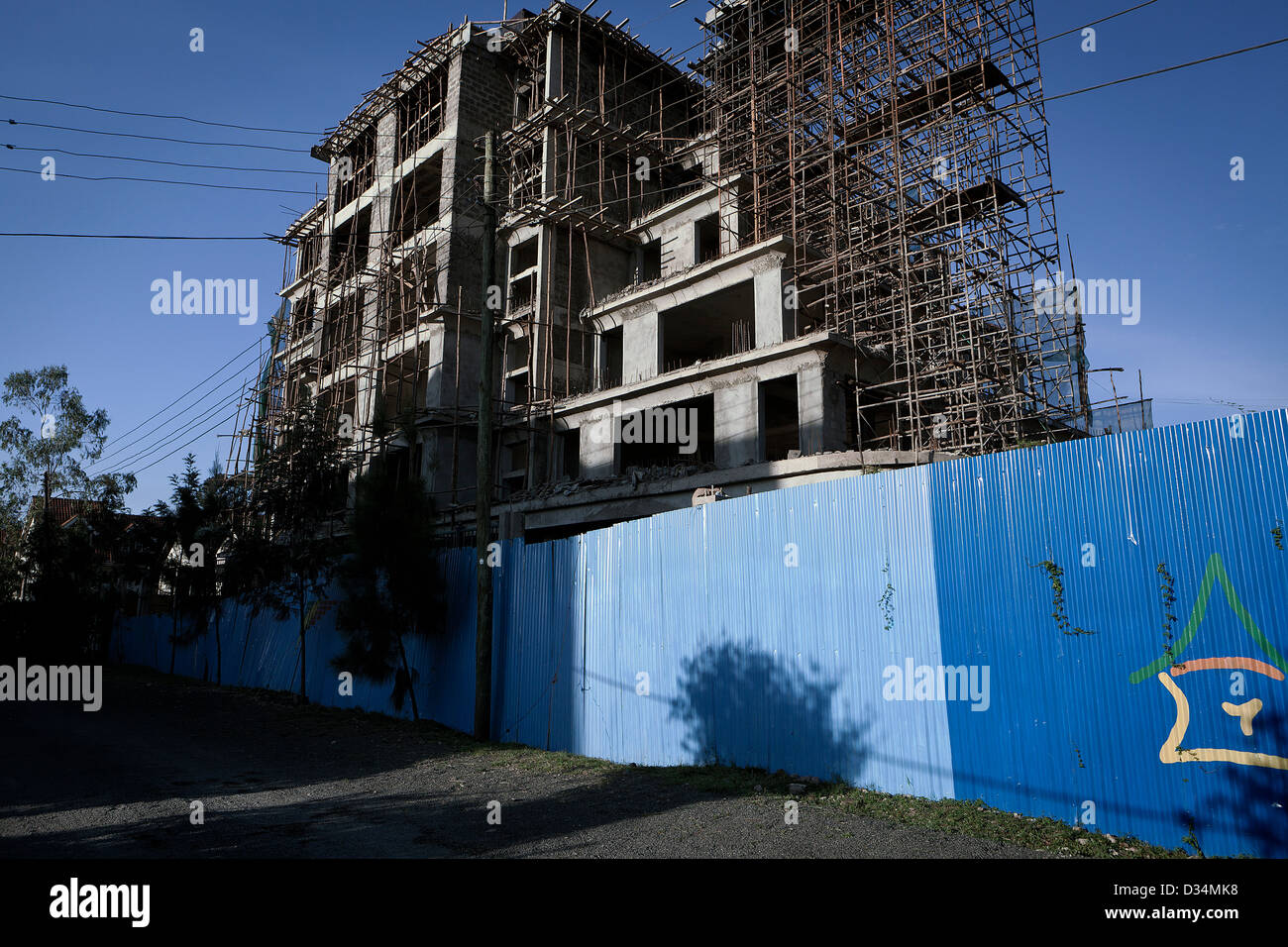 Old-fashioned scaffolding on a modern construction site in the heart of ...