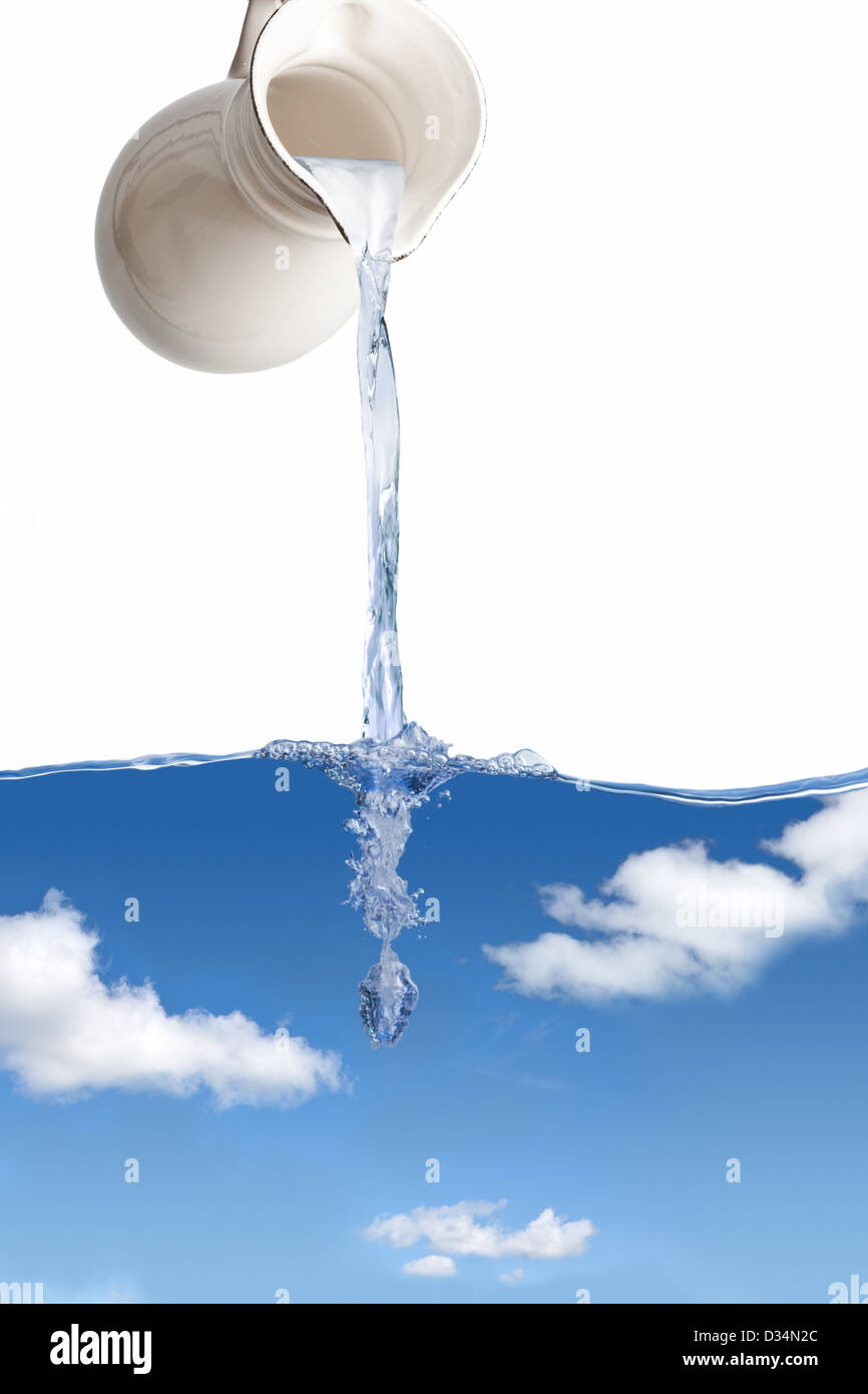 A concept image showing a large pitcher, pouring the sky over white as ...