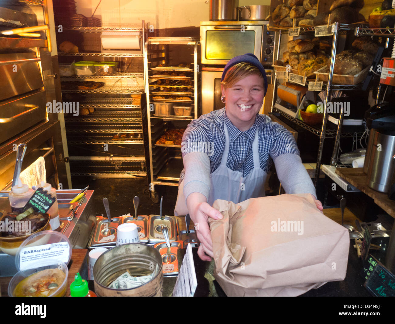 Handing out food container hi-res stock photography and images - Alamy