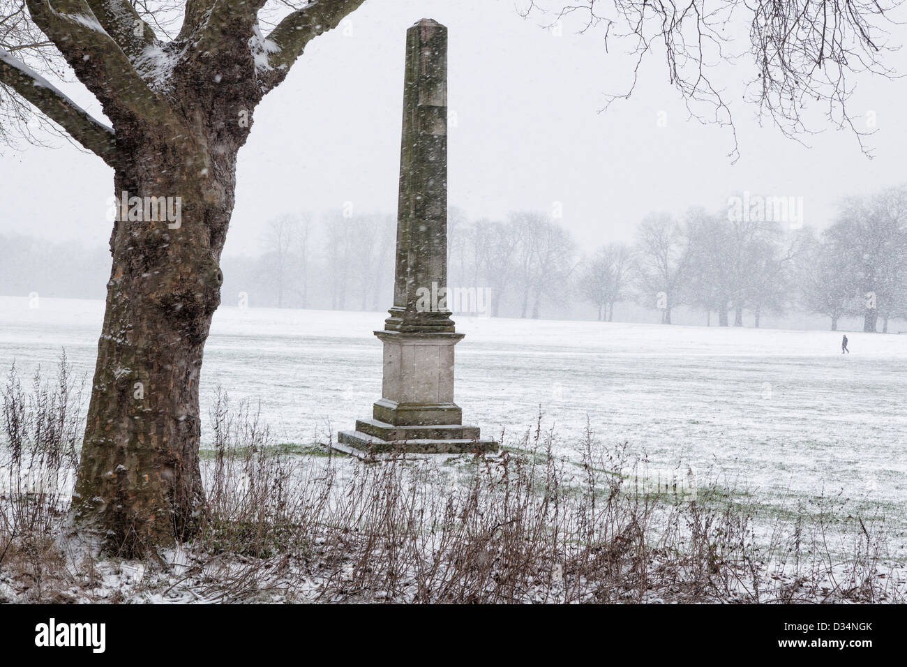 Obelisk, trees and a snow covered Old Deer Park in cold winter weather ...