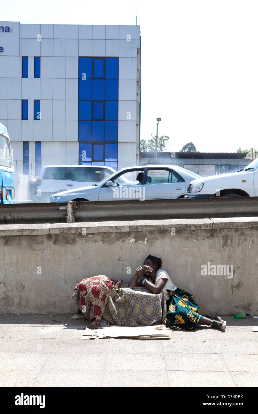 A homeless person sitting and begging on the streets of Lusaka, Zambia ...