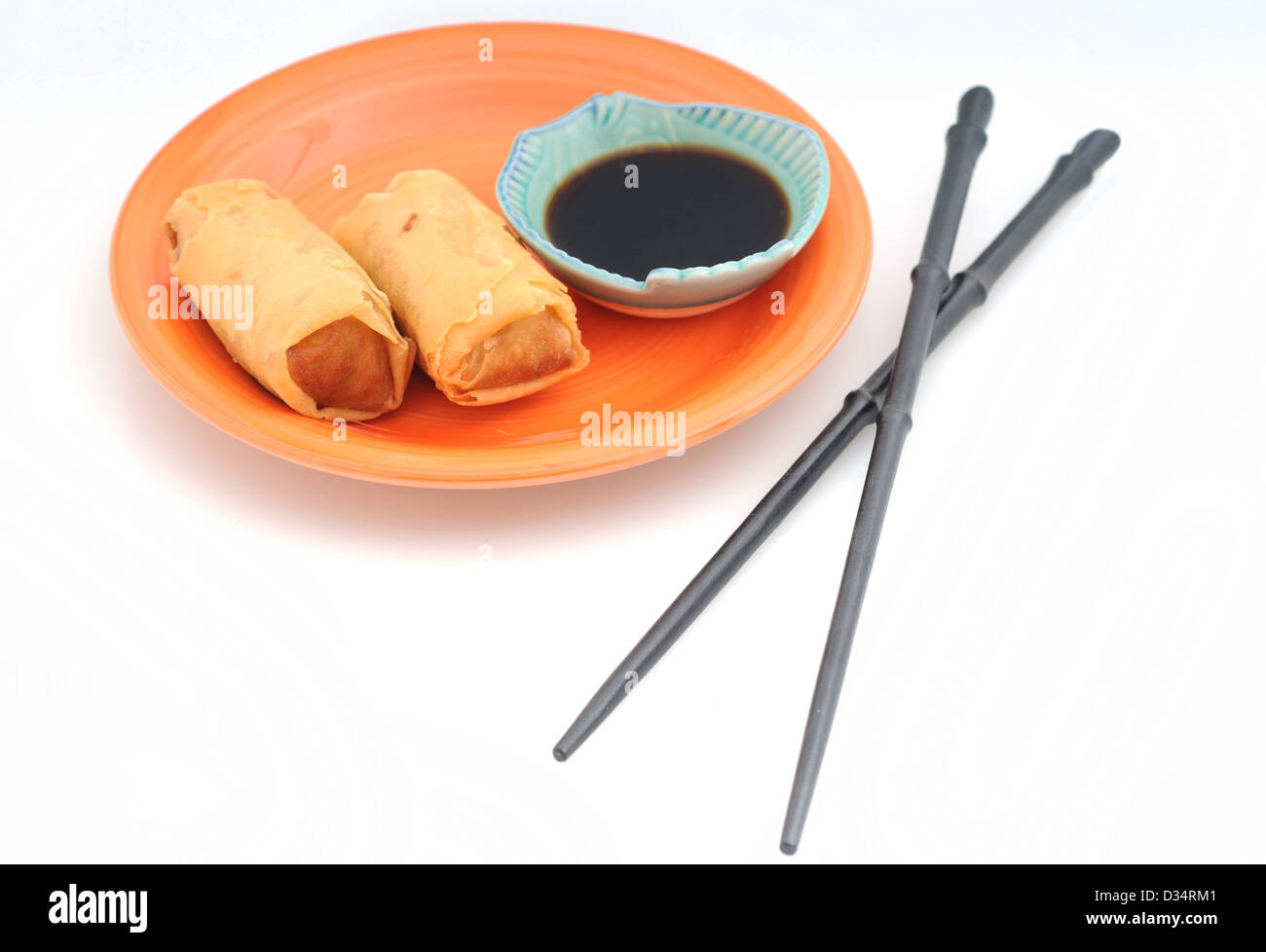 Two spring rolls or egg rolls with chopsticks Stock Photo - Alamy