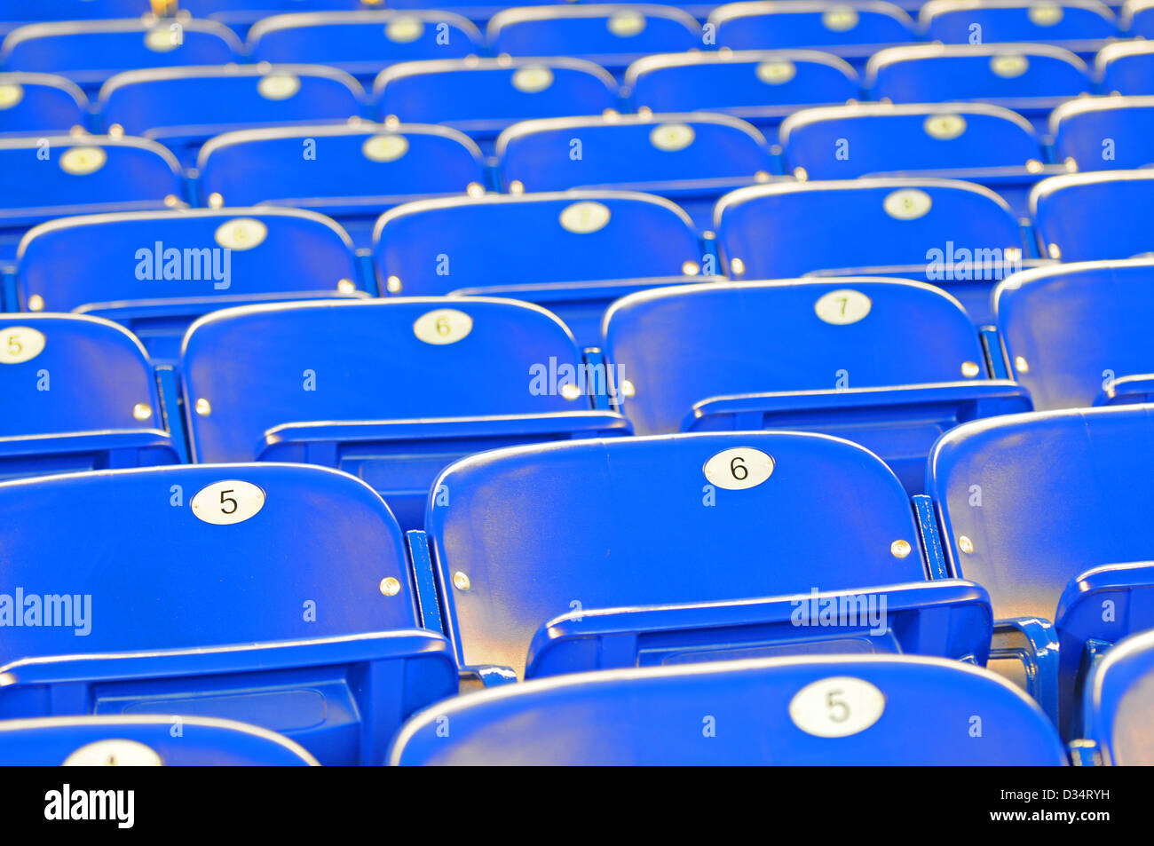 blue chairs and stadium seating Stock Photo - Alamy