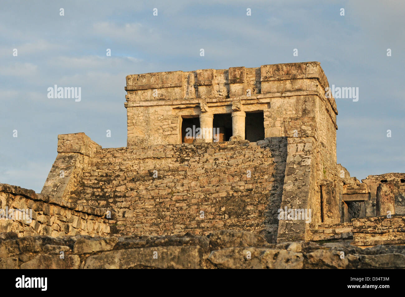 Ancient Mayan Temple Ruins agains blue and cloudy sky in Mexico Stock ...