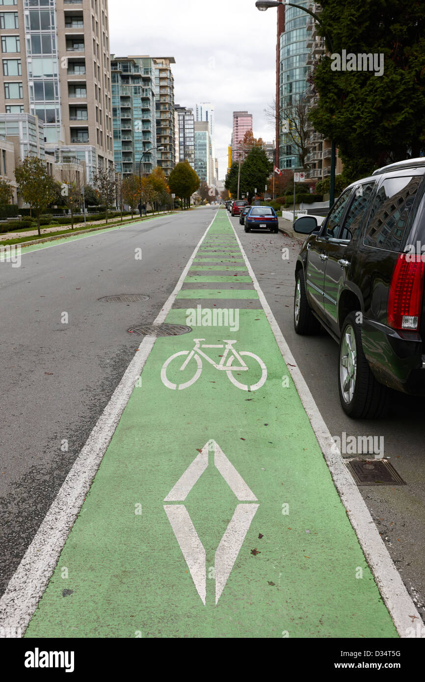 cycle lane painted on road beside onstreet parking Vancouver BC Canada ...