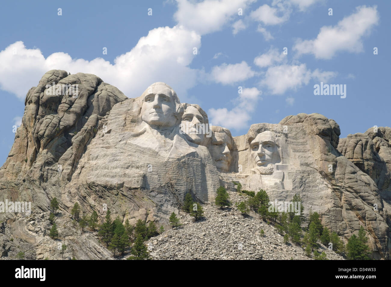 Blue sky white clouds view American Presidents sculptures in granite ...
