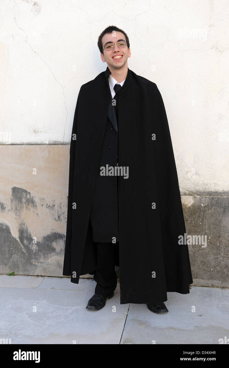 University of Coimbra student with traditional academic attire traje ...