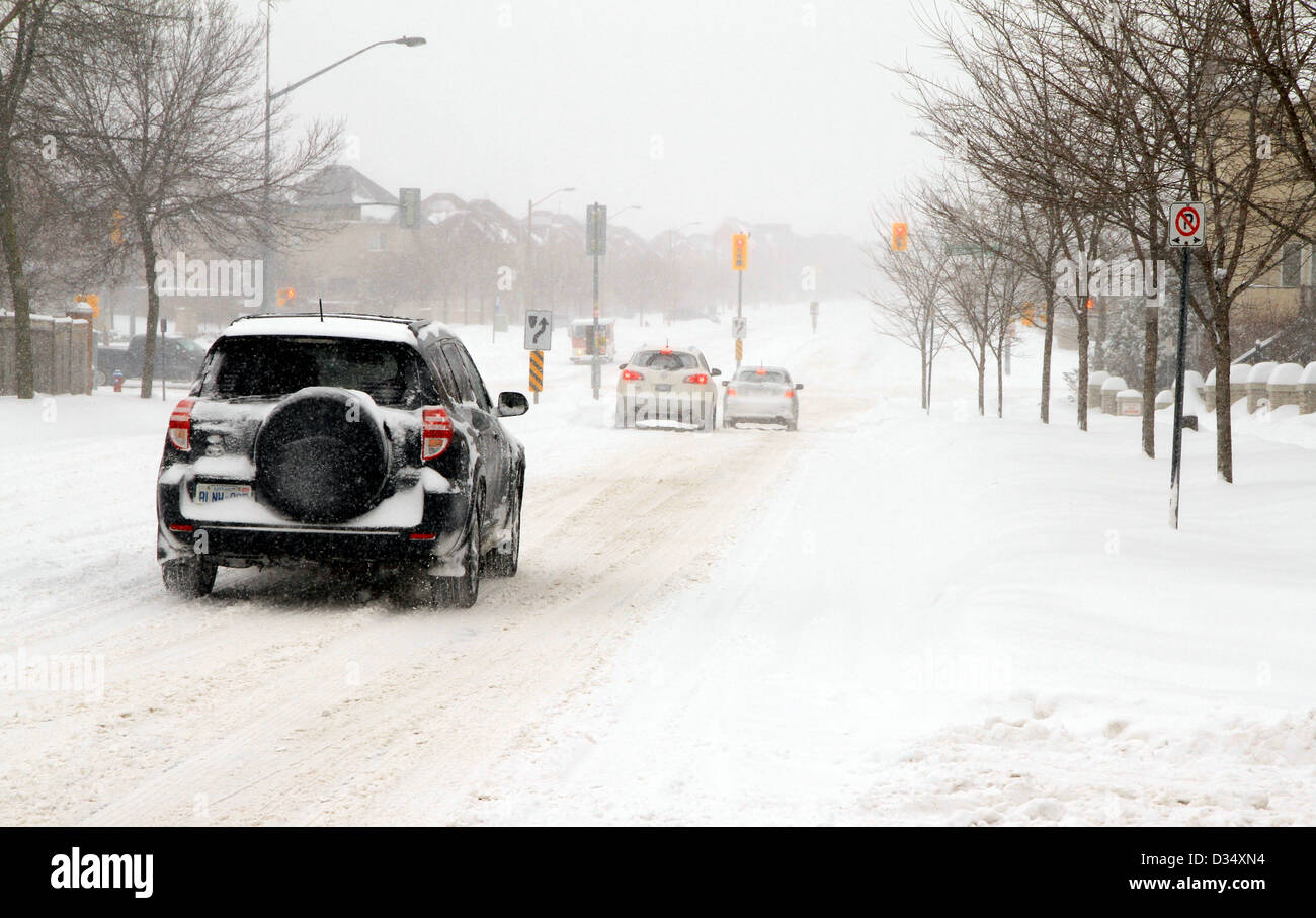 Vehicles in Snow Stock Photo - Alamy