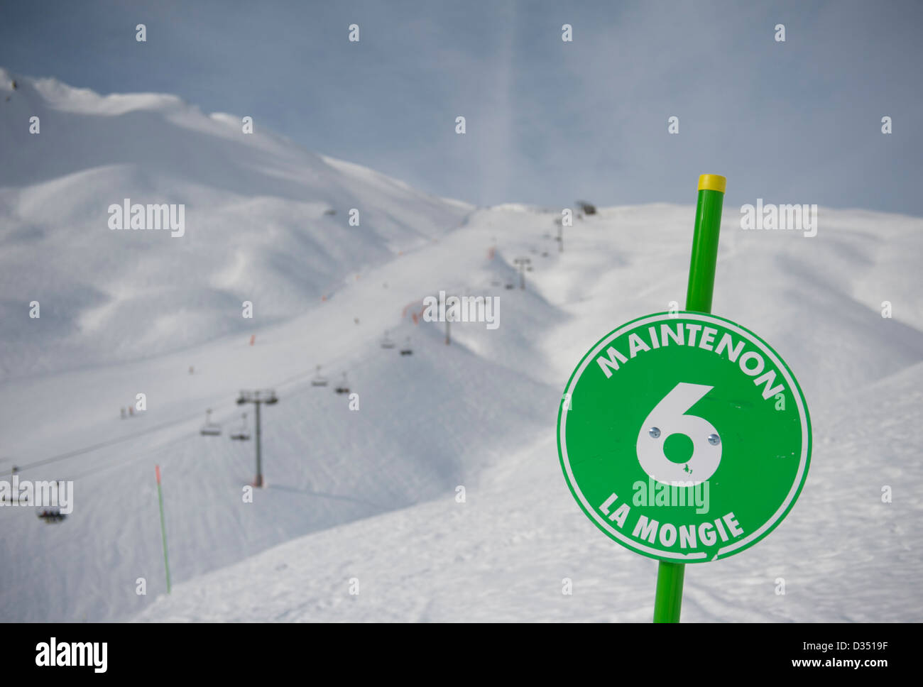 Marker of an easy green slope leading the way to La Mongie, station of ...