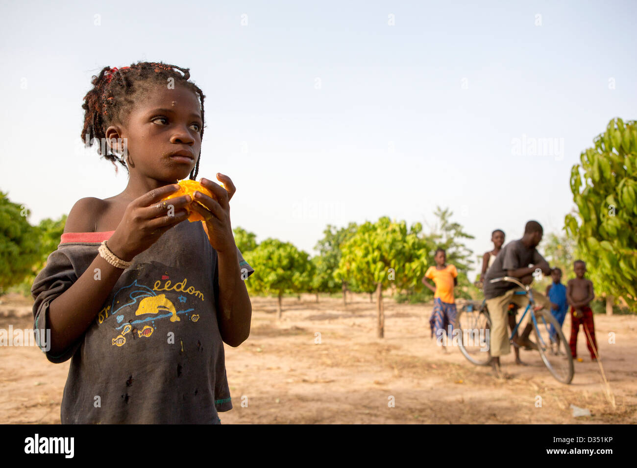 Child mango eat africa hi-res stock photography and images - Alamy