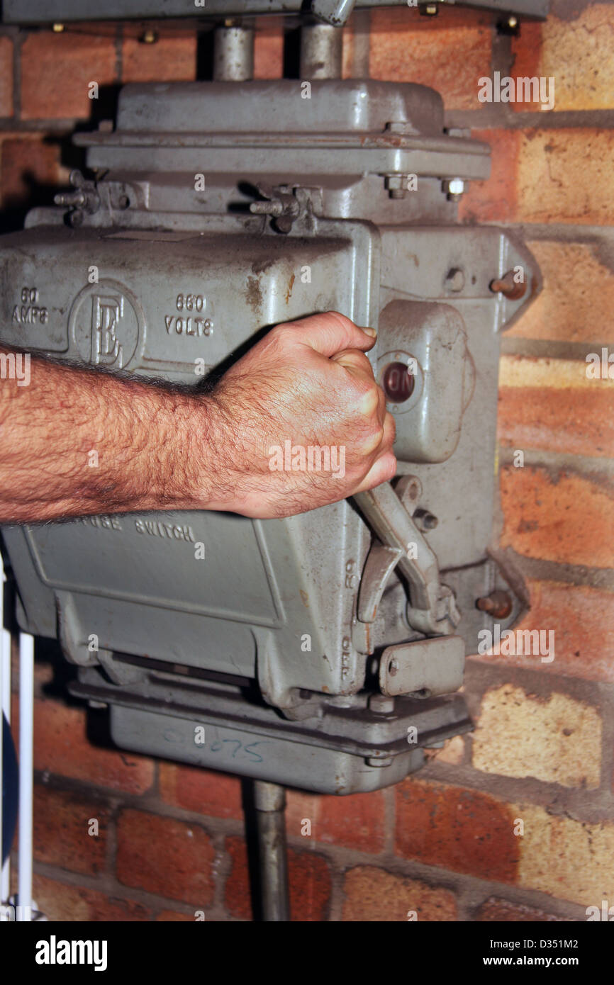 Hand operation large electrical isolation lever Stock Photo - Alamy