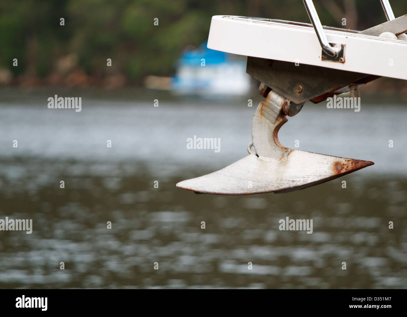 A rusty sharp boat anchor Stock Photo - Alamy