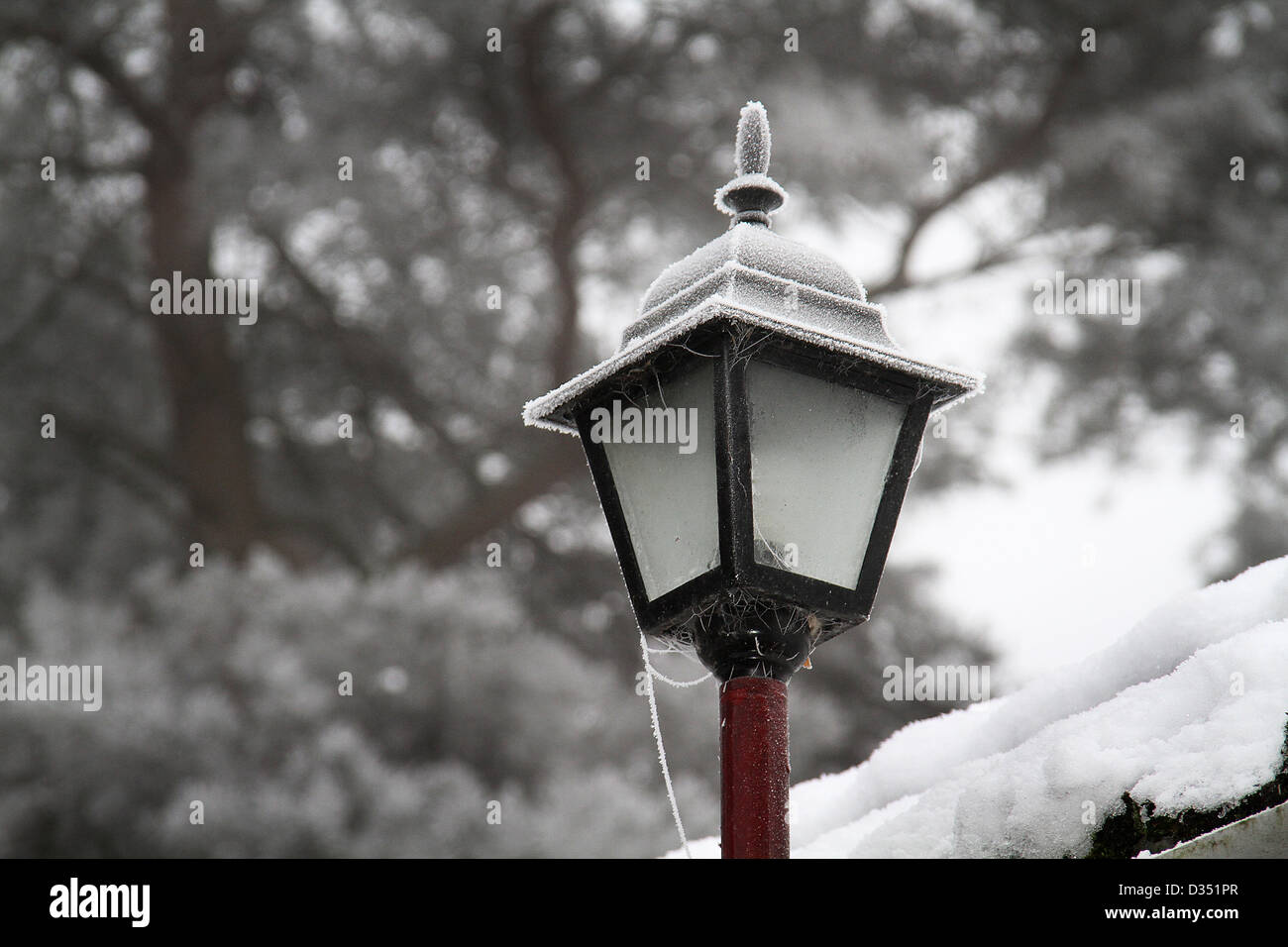 Frost on garden lamp Stock Photo - Alamy