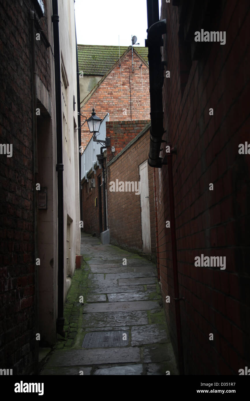 Narrow alley in Whitby, North Yorkshire Stock Photo - Alamy