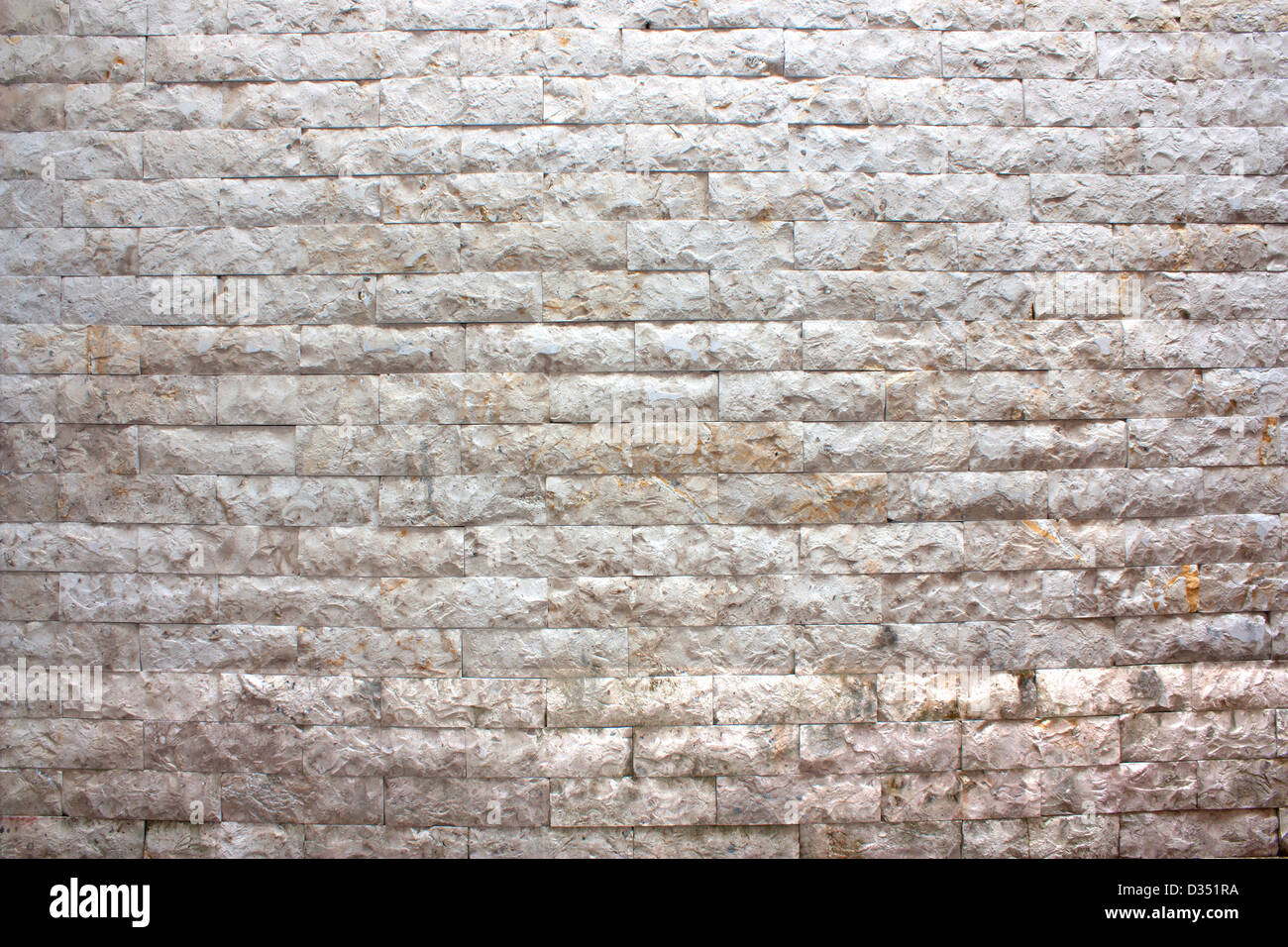 Background of stone wall made with blocks Stock Photo - Alamy