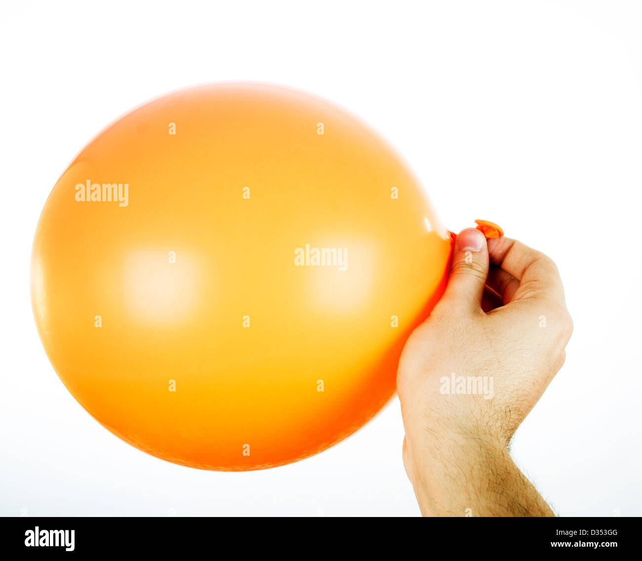 Ballon in a man's hand isolated Stock Photo - Alamy