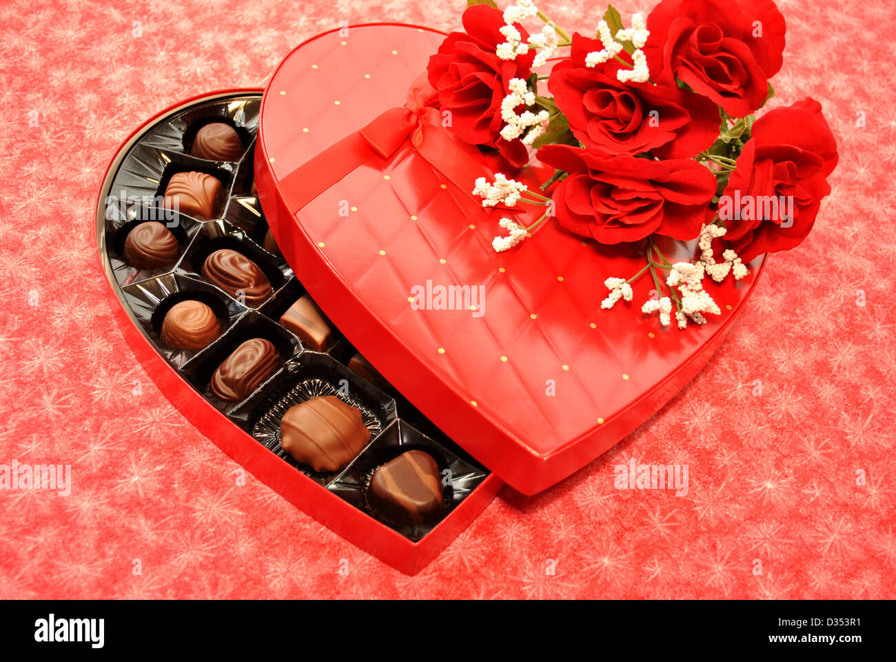 Valentine's Candy with Red Roses Stock Photo - Alamy