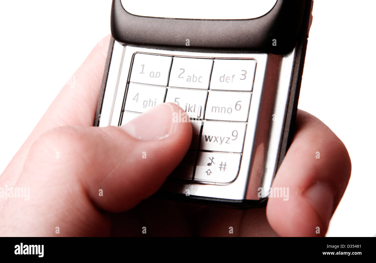 Cell Phone in a man hand. Isolated on white background Stock Photo - Alamy