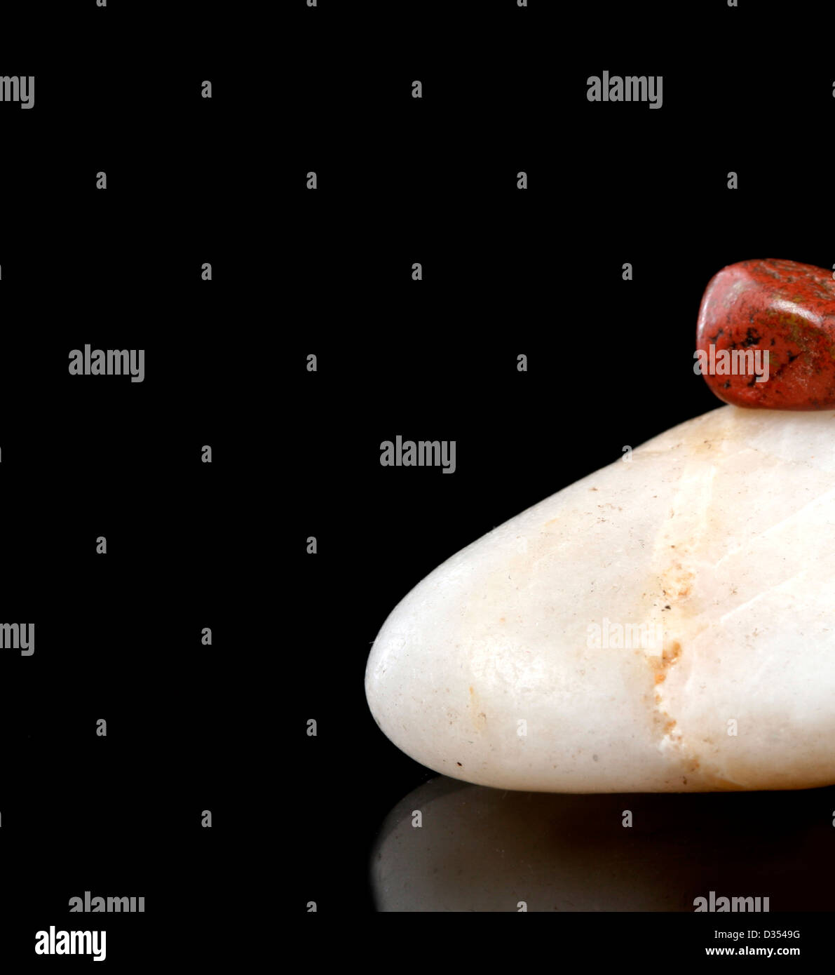 Concept made by many rocks isolated on black Stock Photo - Alamy