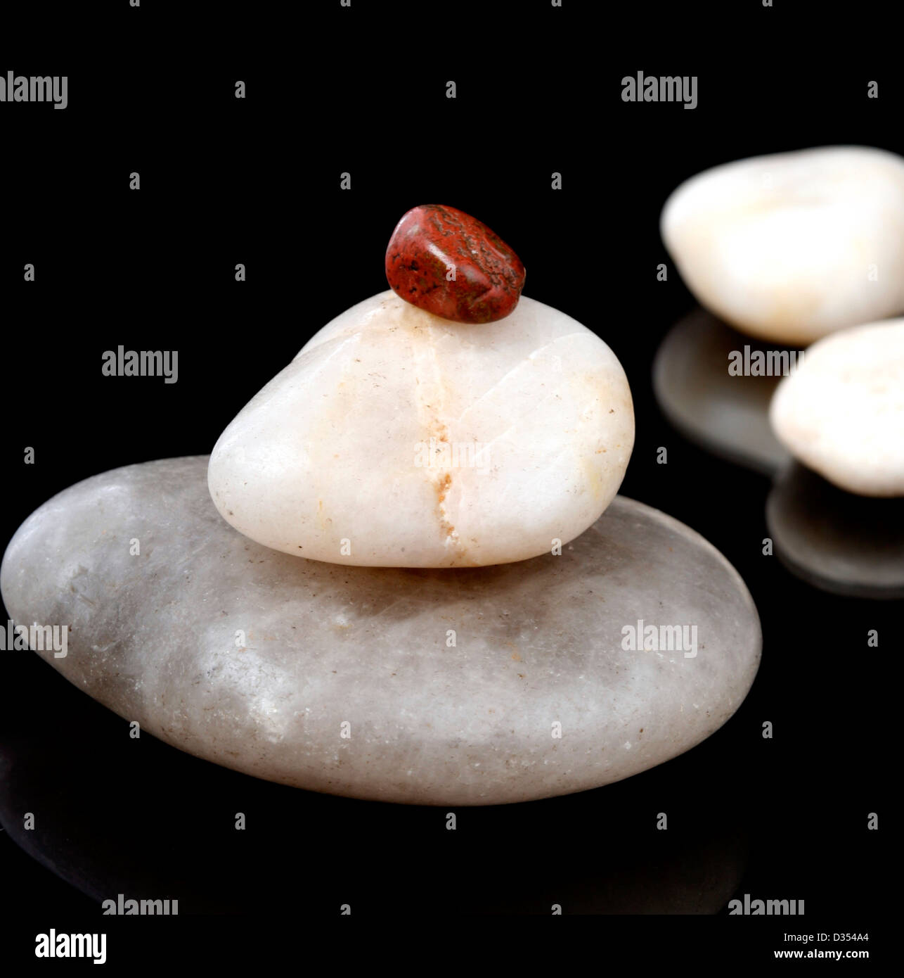 Concept made by many rocks isolated on black Stock Photo - Alamy