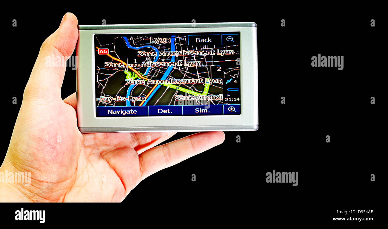 Gps in a man hand. Find your way ! Stock Photo - Alamy