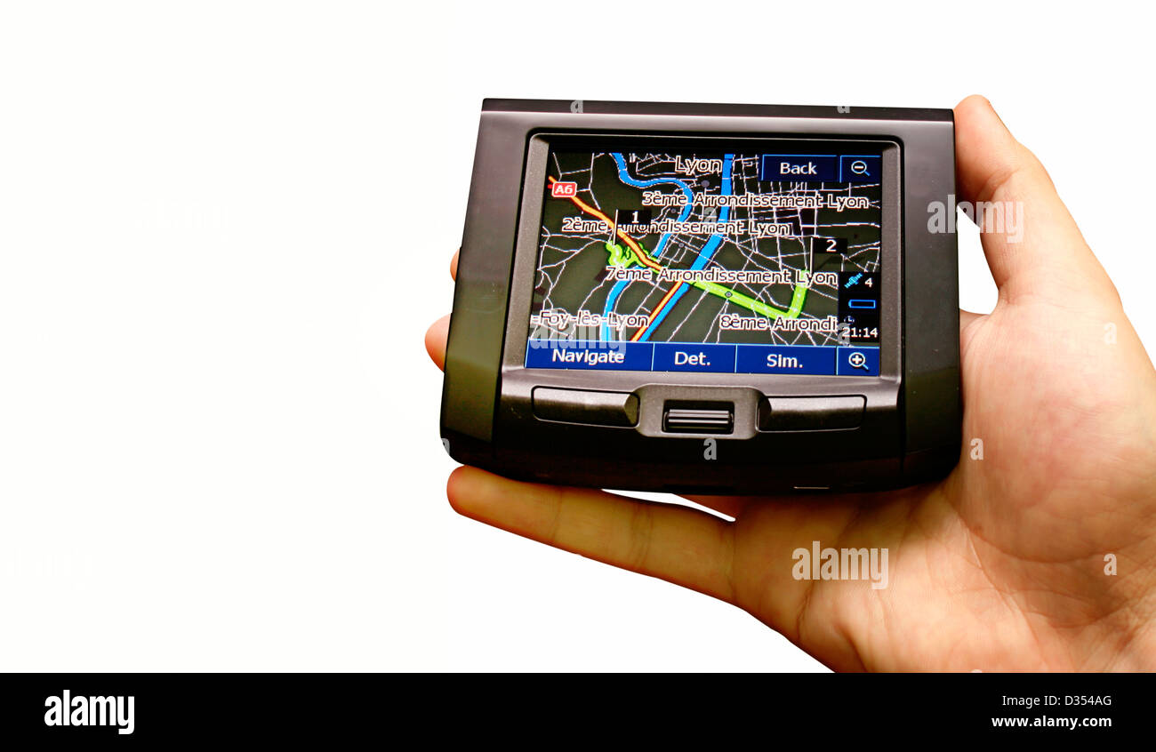 Gps in a man hand. Find your way ! Stock Photo - Alamy