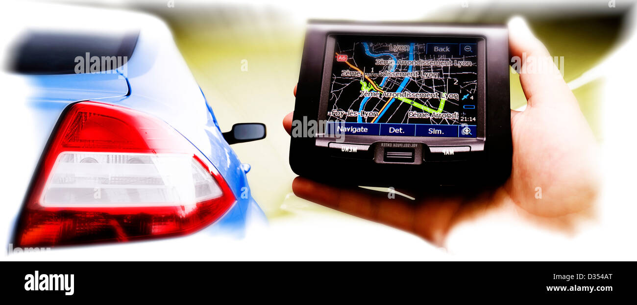 Gps in a man hand. Find your way ! Stock Photo - Alamy