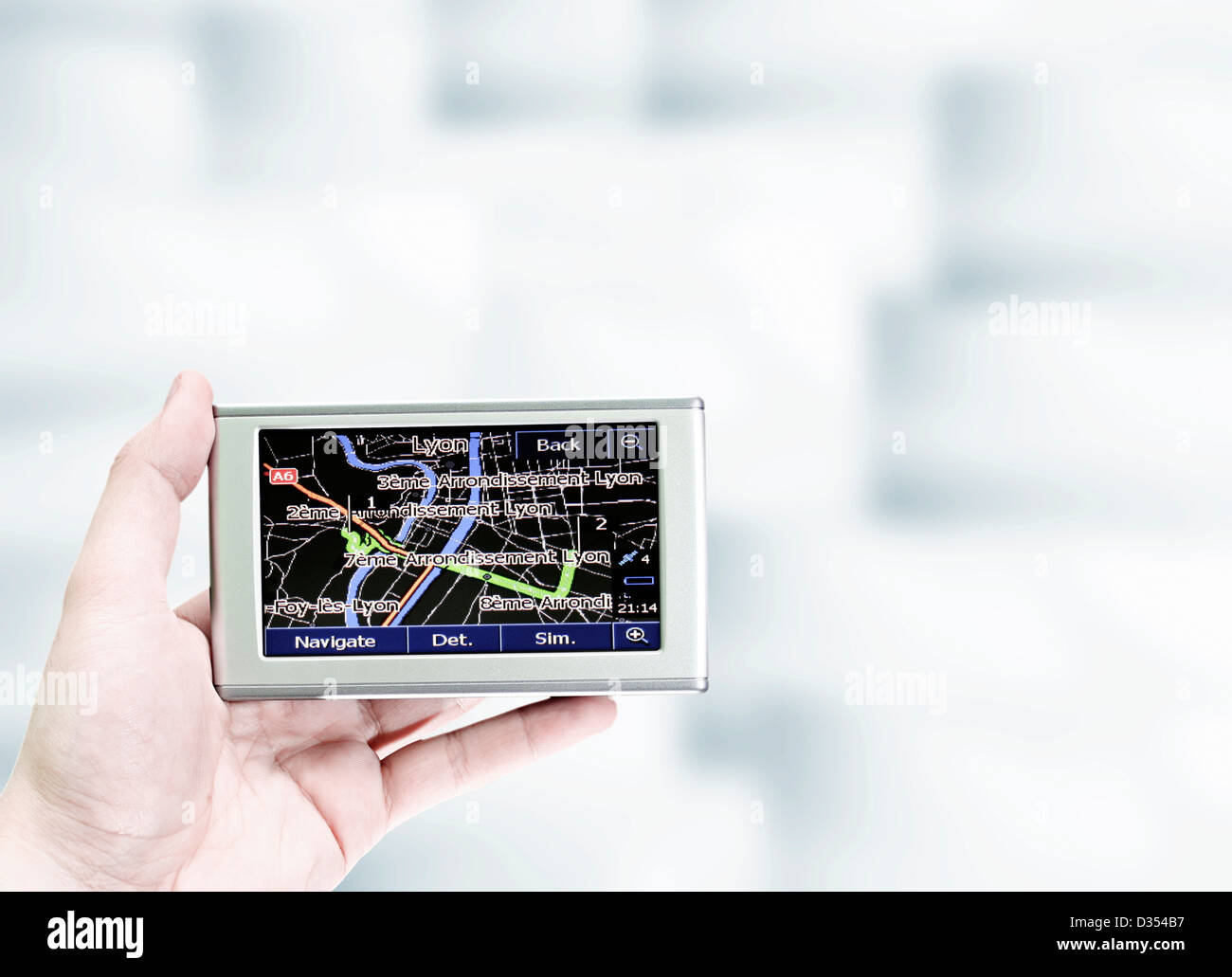Gps in a man hand. Find your way ! Stock Photo - Alamy