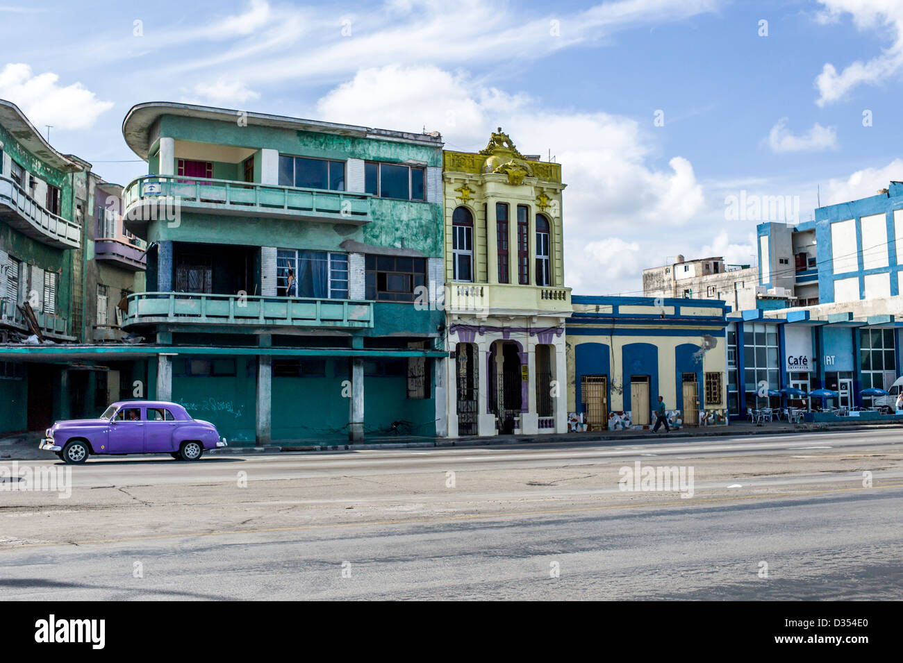 Street scene with 19050s american car and yellow tourist vehicle on the ...