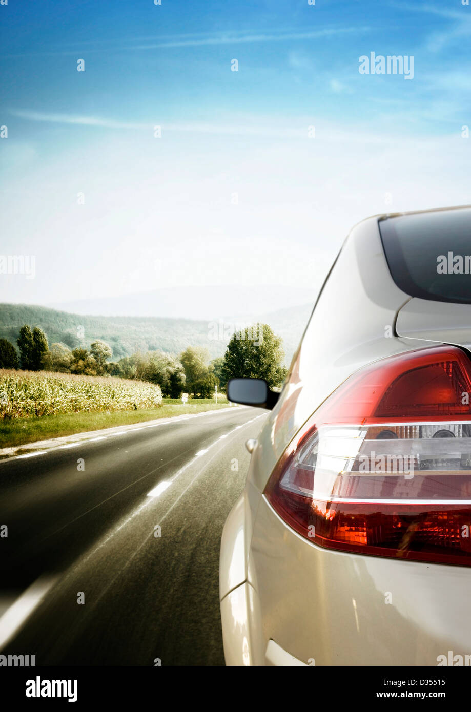Car detail - back side, half. On the road Stock Photo - Alamy