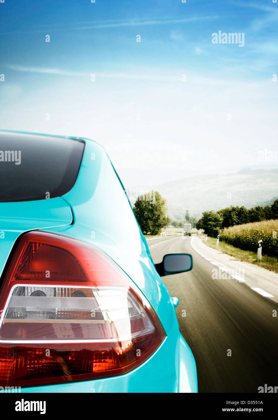 Car detail - back side, half. On the road Stock Photo - Alamy