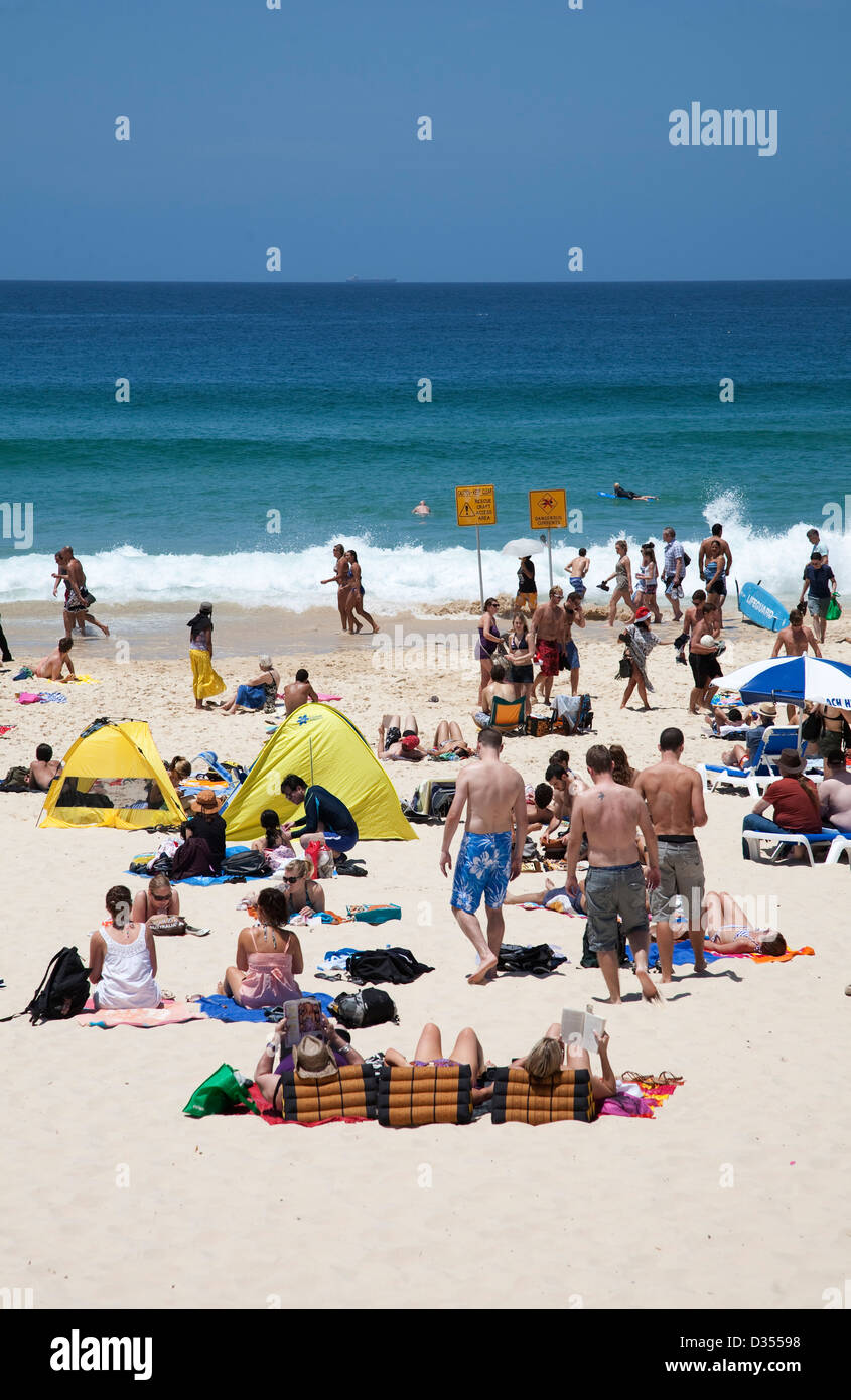 During a warm summer's day crowds of people flock to Australia's iconic ...