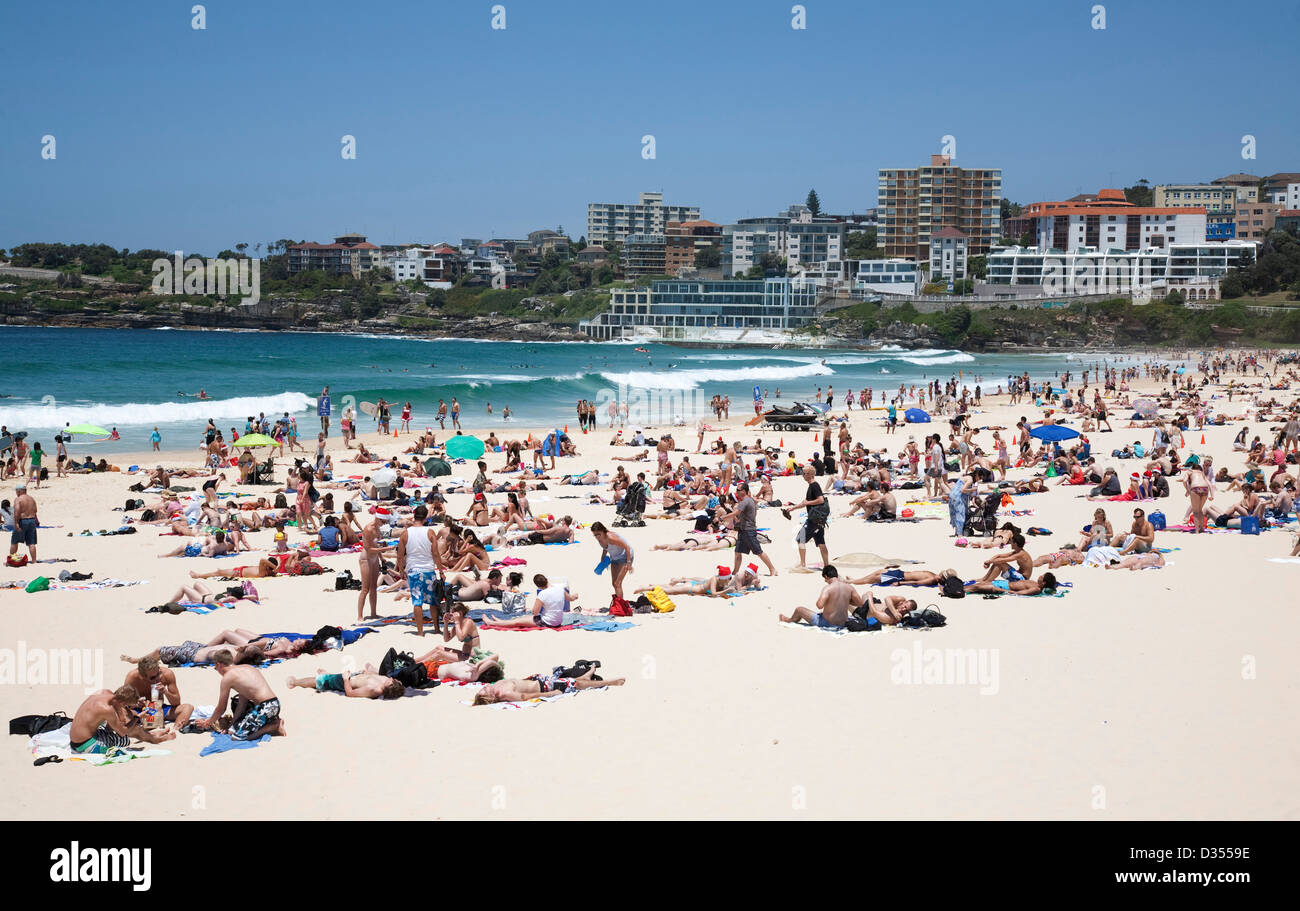 During a warm summer's day crowds of people flock to Australia's iconic ...