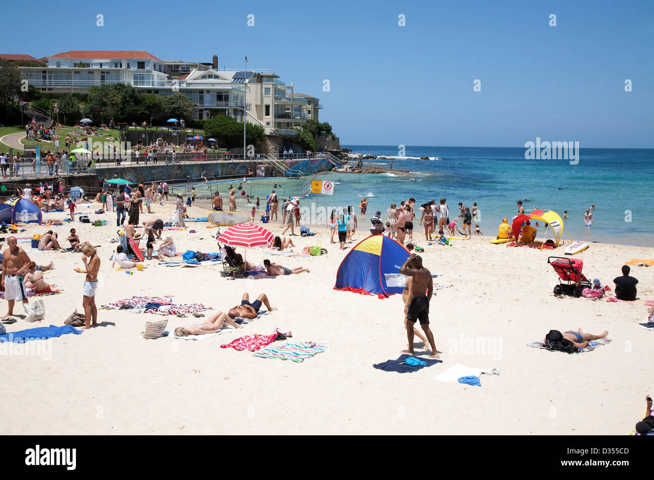 During a warm summer's day crowds of people flock to Australia's iconic ...