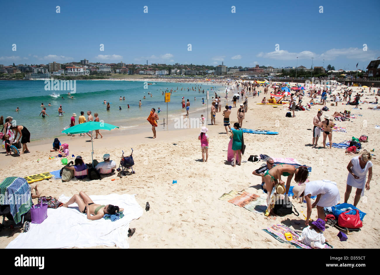 During a warm summer's day crowds of people flock to Australia's iconic ...