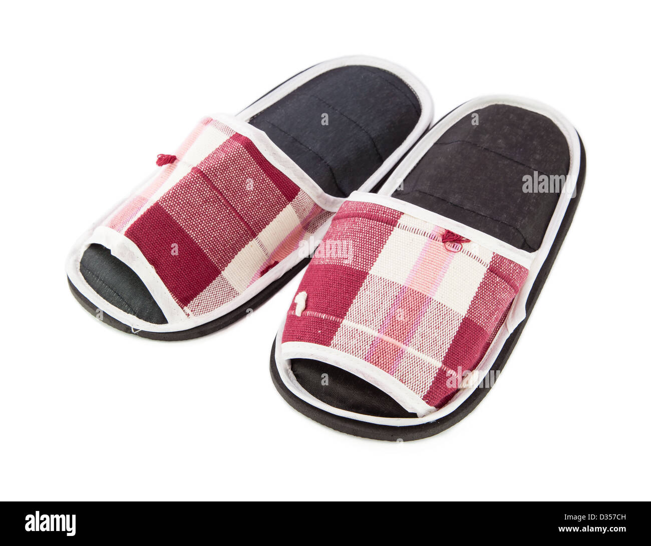 A pair of red slippers isolated on white background Stock Photo - Alamy