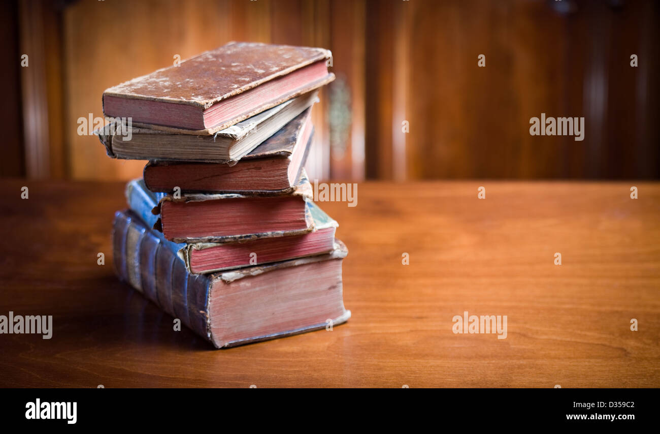 Old looking books in pile hi-res stock photography and images - Alamy