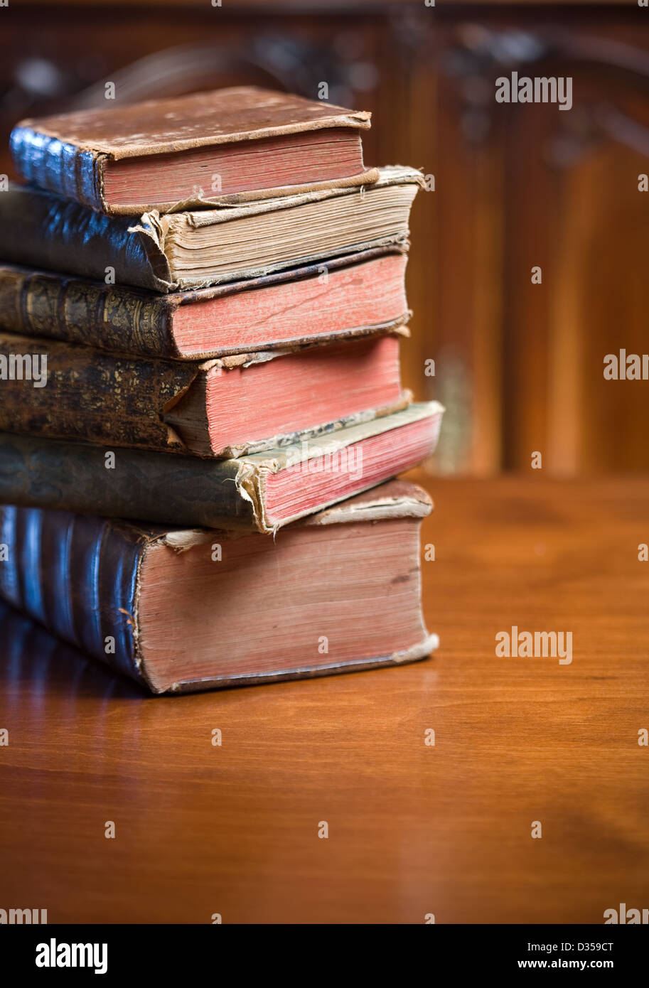 Beautiful antique books in very elegant setting Stock Photo - Alamy