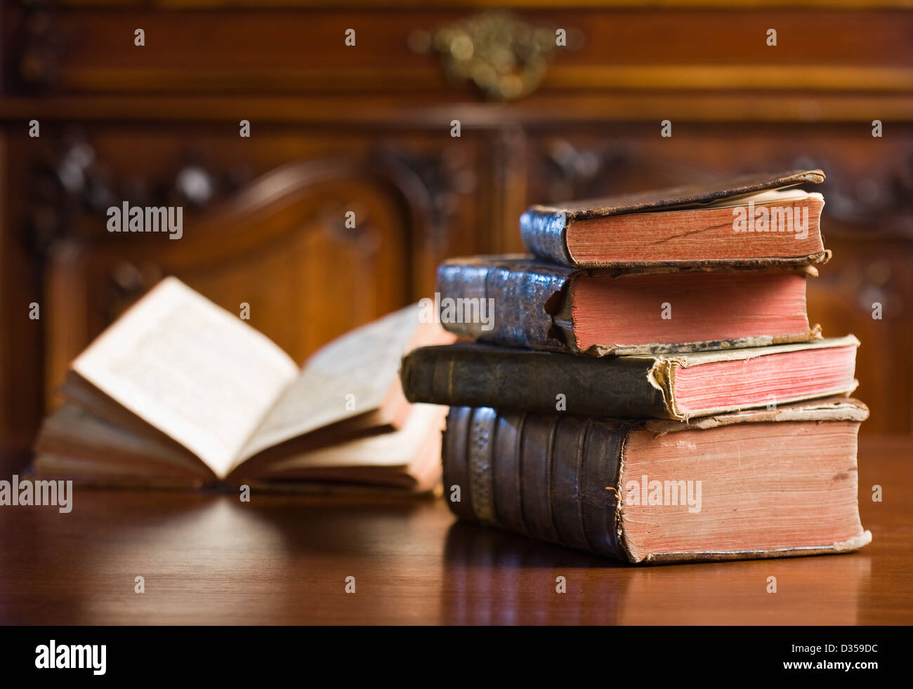 Old looking books in pile hi-res stock photography and images - Alamy